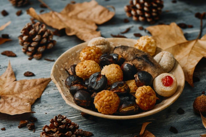 What is La Castanyada festival and what are the panellets?